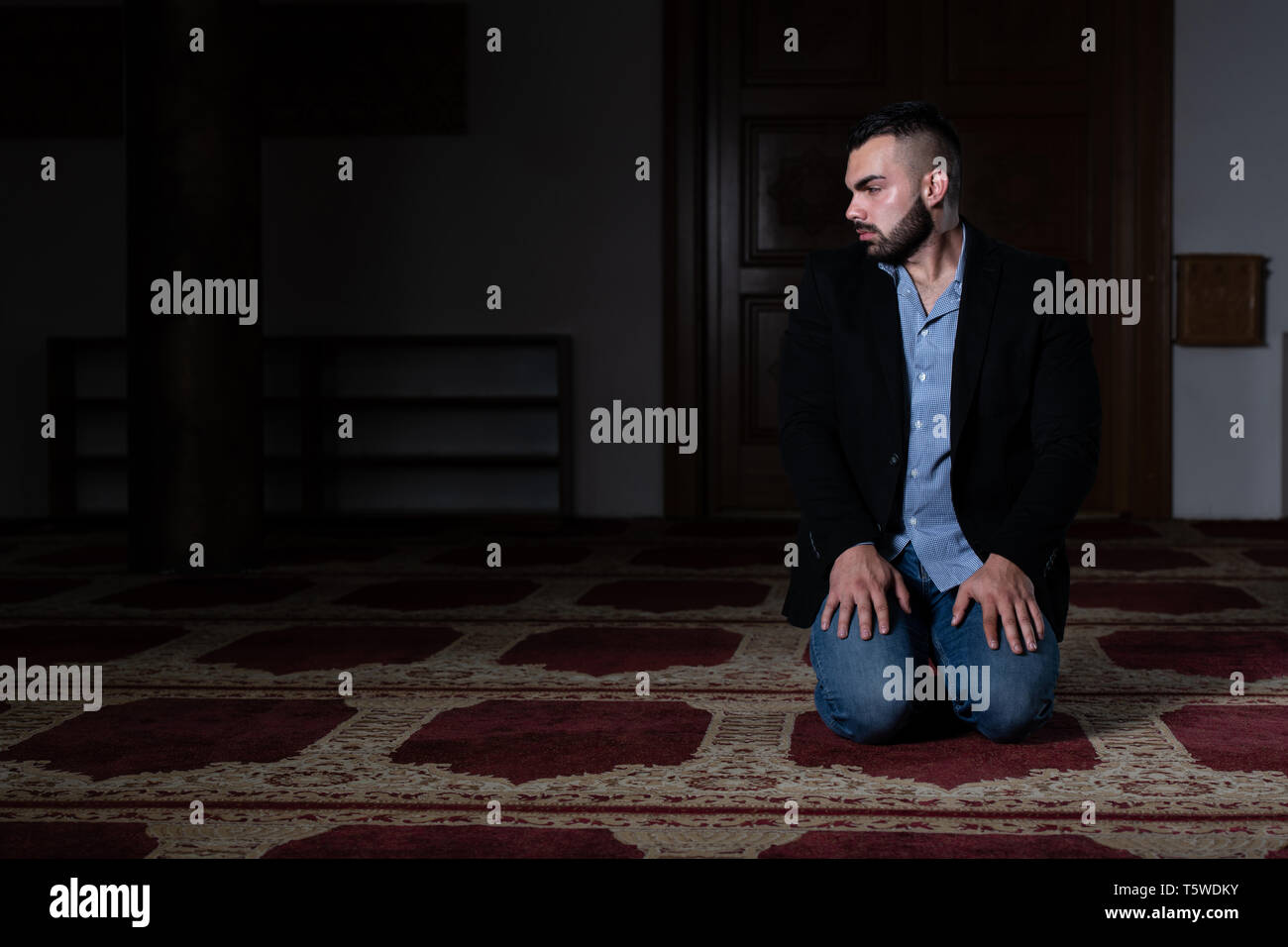 Attractive Man Making Traditional Prayer to God Allah in the Mosque ...