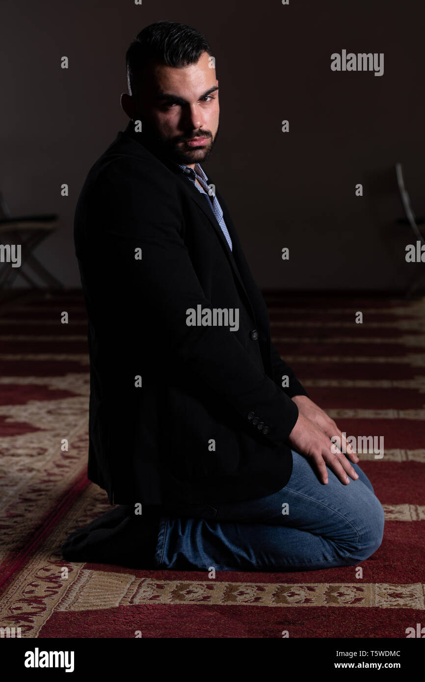 Attractive Man Making Traditional Prayer to God Allah in the Mosque ...