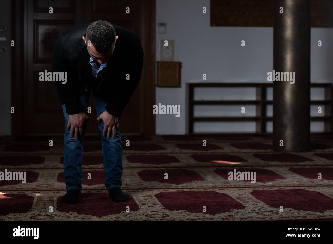 Attractive Man Making Traditional Prayer to God Allah in the Mosque ...