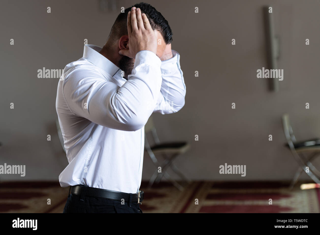 Attractive Man Making Traditional Prayer to God Allah in the Mosque ...
