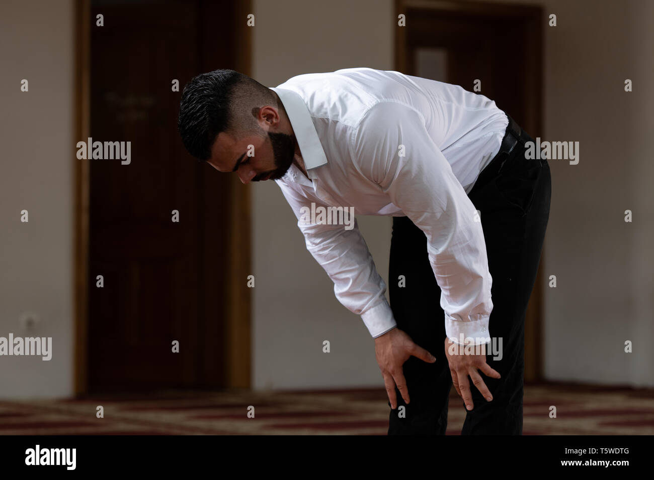 Attractive Man Making Traditional Prayer to God Allah in the Mosque ...