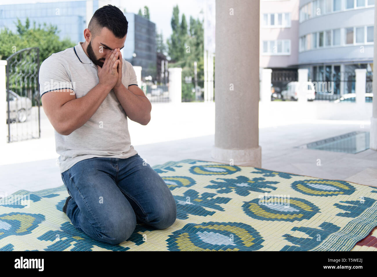 Attractive Man Making Traditional Prayer to God Allah in the Mosque ...