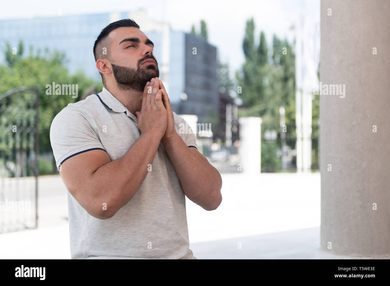Attractive Man Making Traditional Prayer to God Allah in the Mosque ...