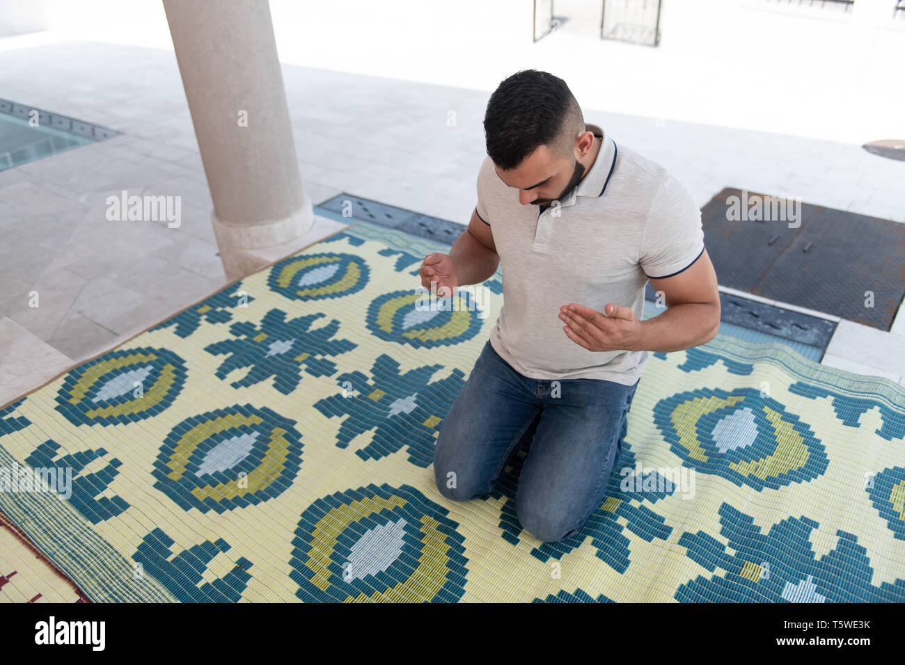 Muslim Man Making Traditional Prayer to God Allah in the Mosque Stock ...