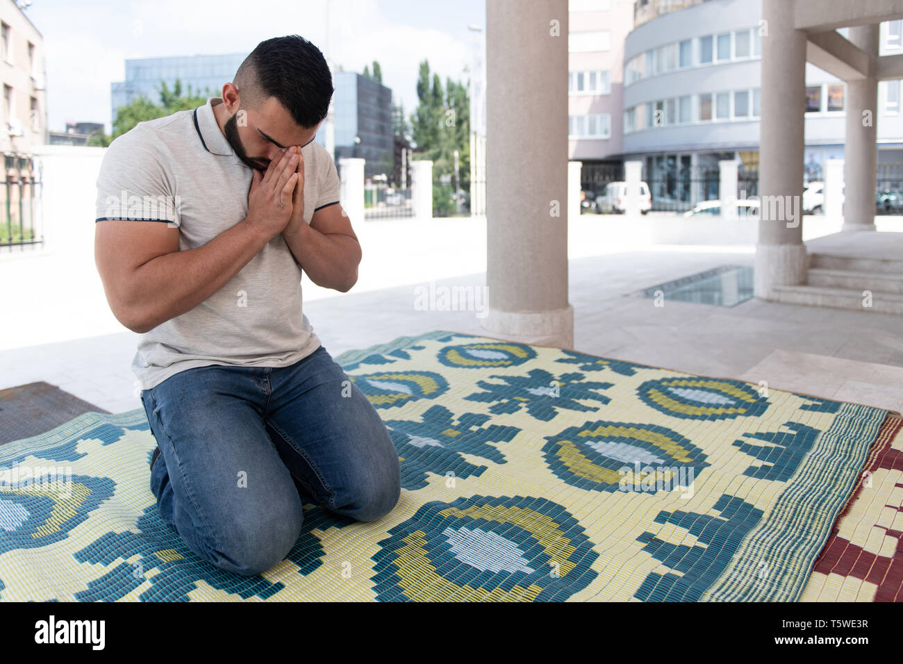 Attractive Man Making Traditional Prayer to God Allah in the Mosque ...