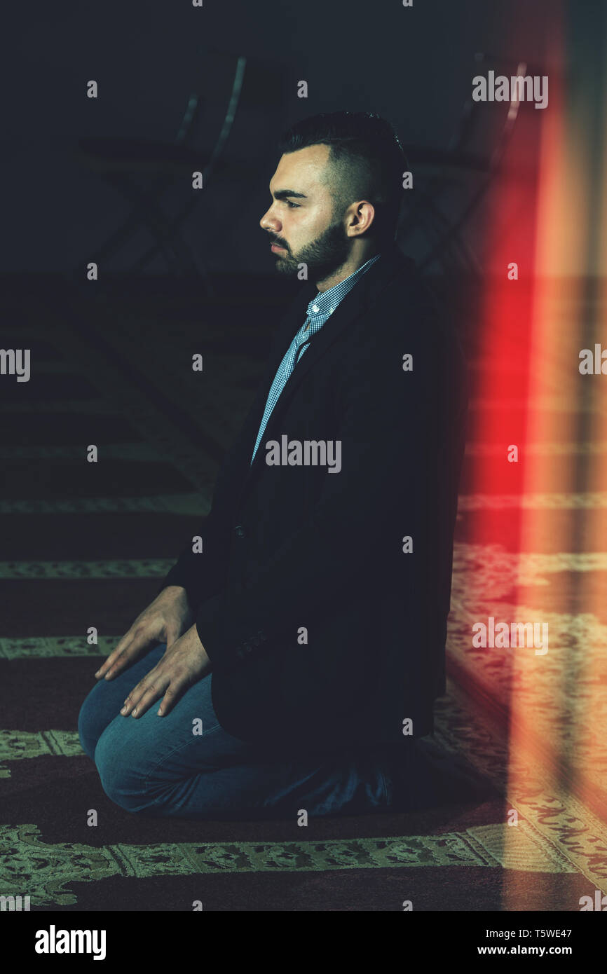Attractive Man Making Traditional Prayer to God Allah in the Mosque ...