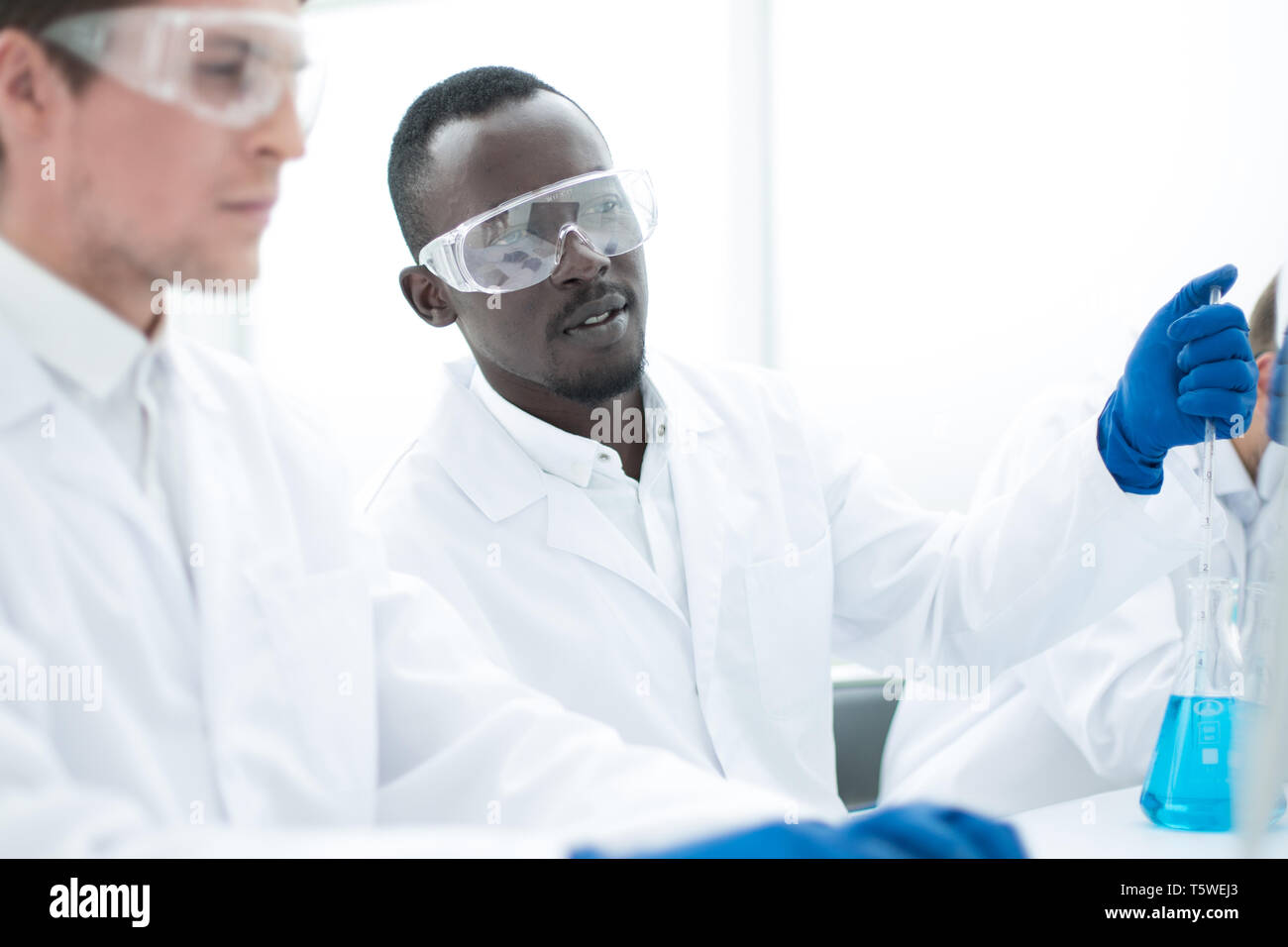 Scientists using modern computer technology hi-res stock photography ...