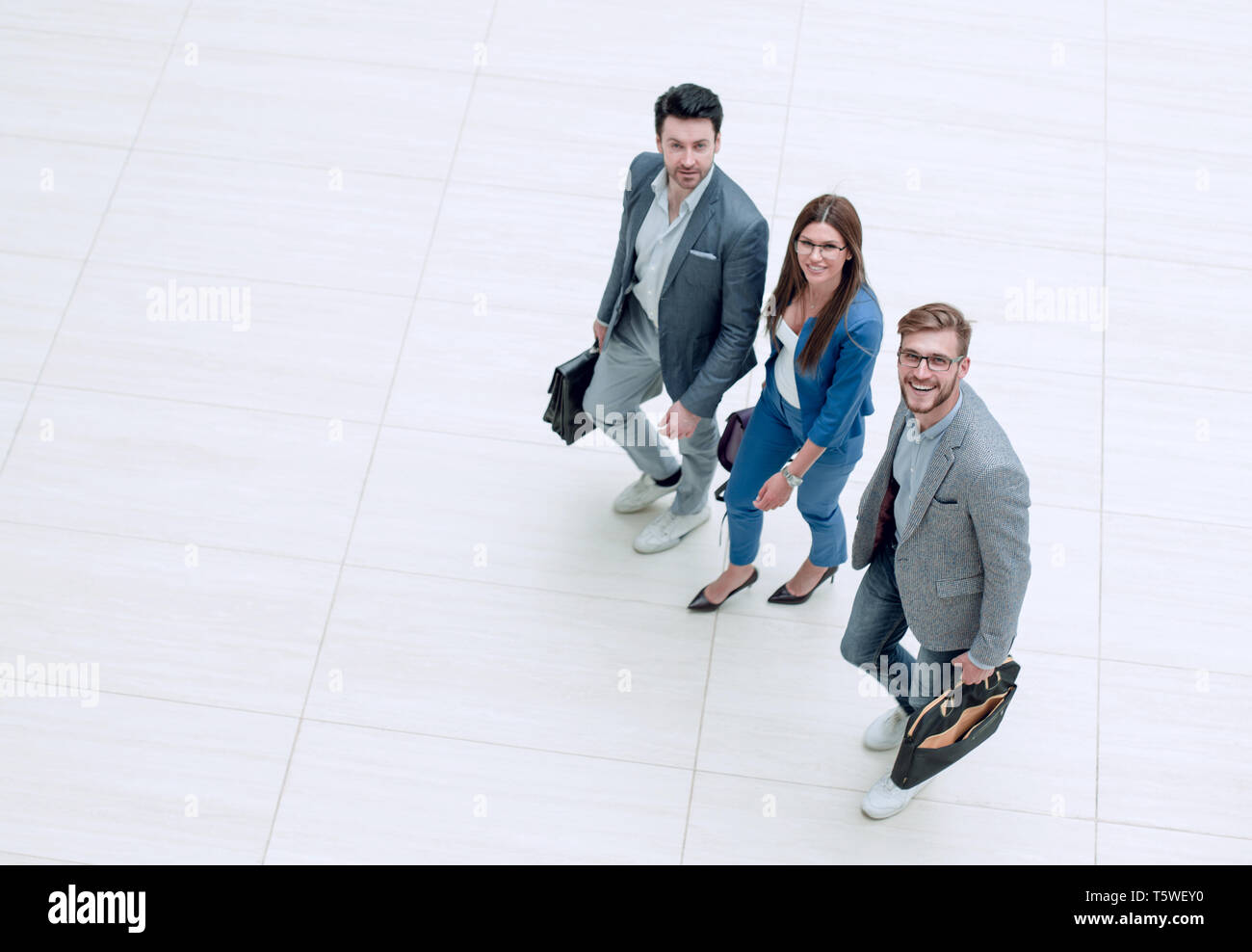 Business people colleagues employees go hi-res stock photography and ...