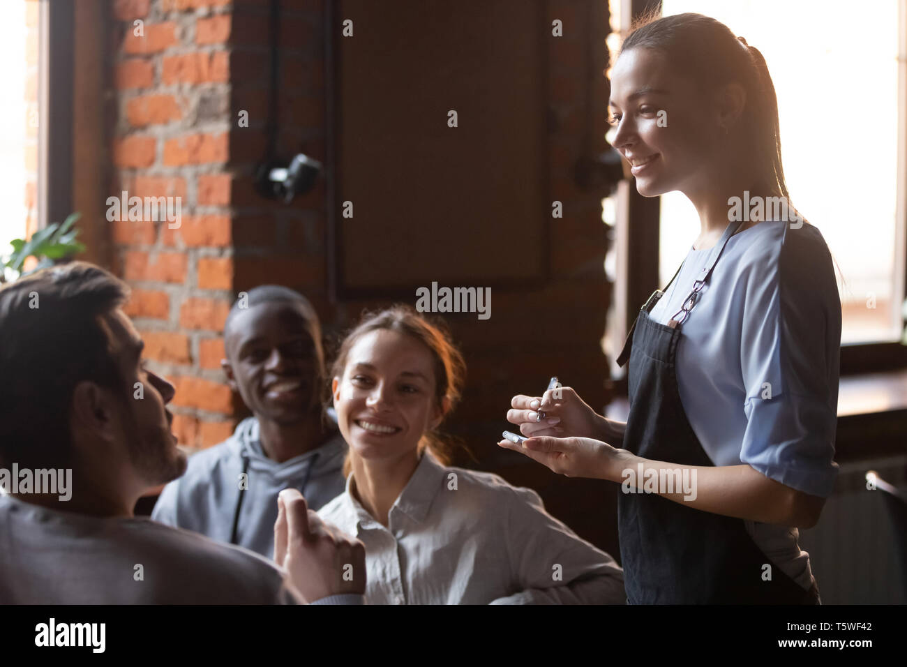 Female waitress friends cafe hi-res stock photography and images - Alamy