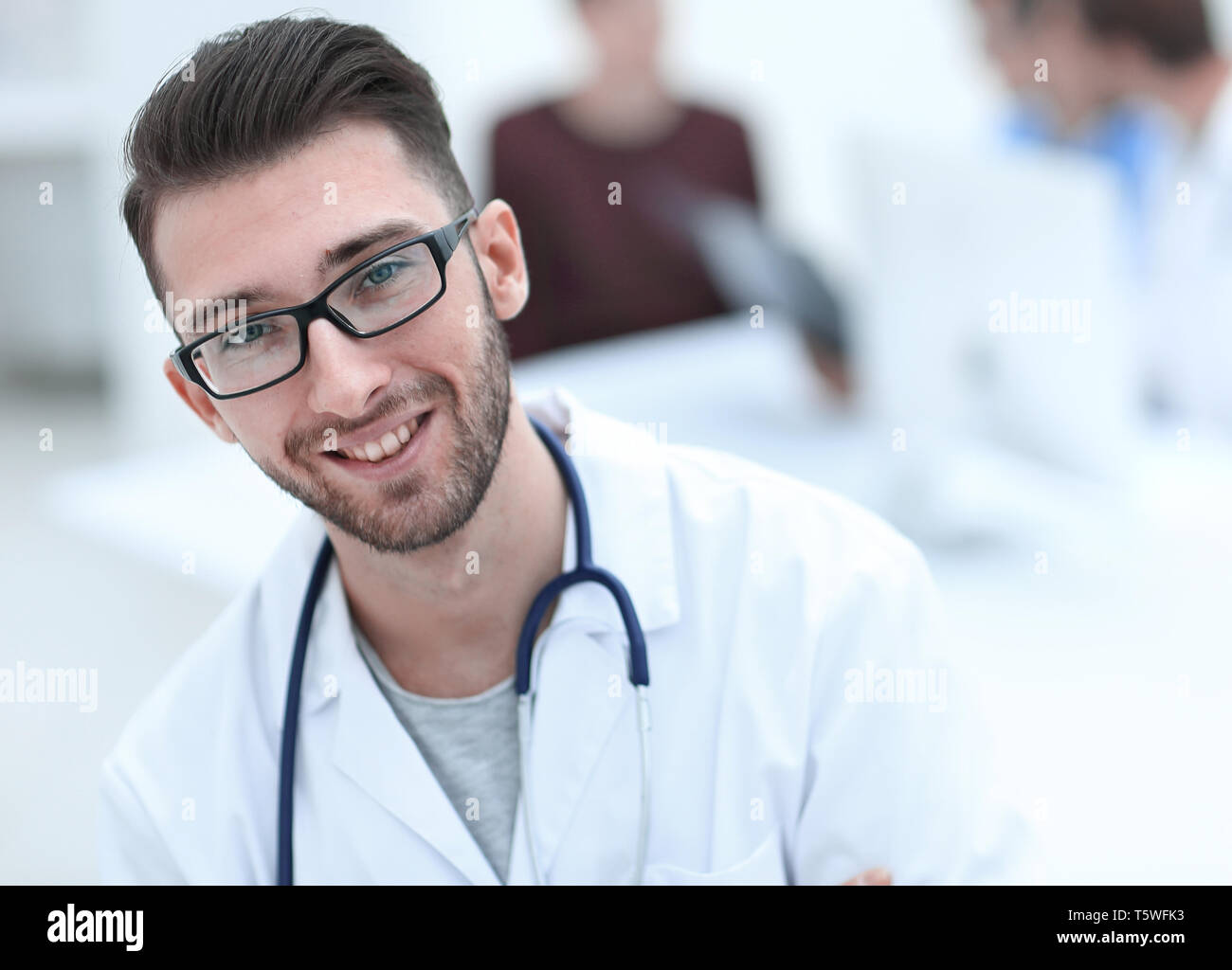 closeup.portrait of a handsome doctor on blurred background .photo with ...