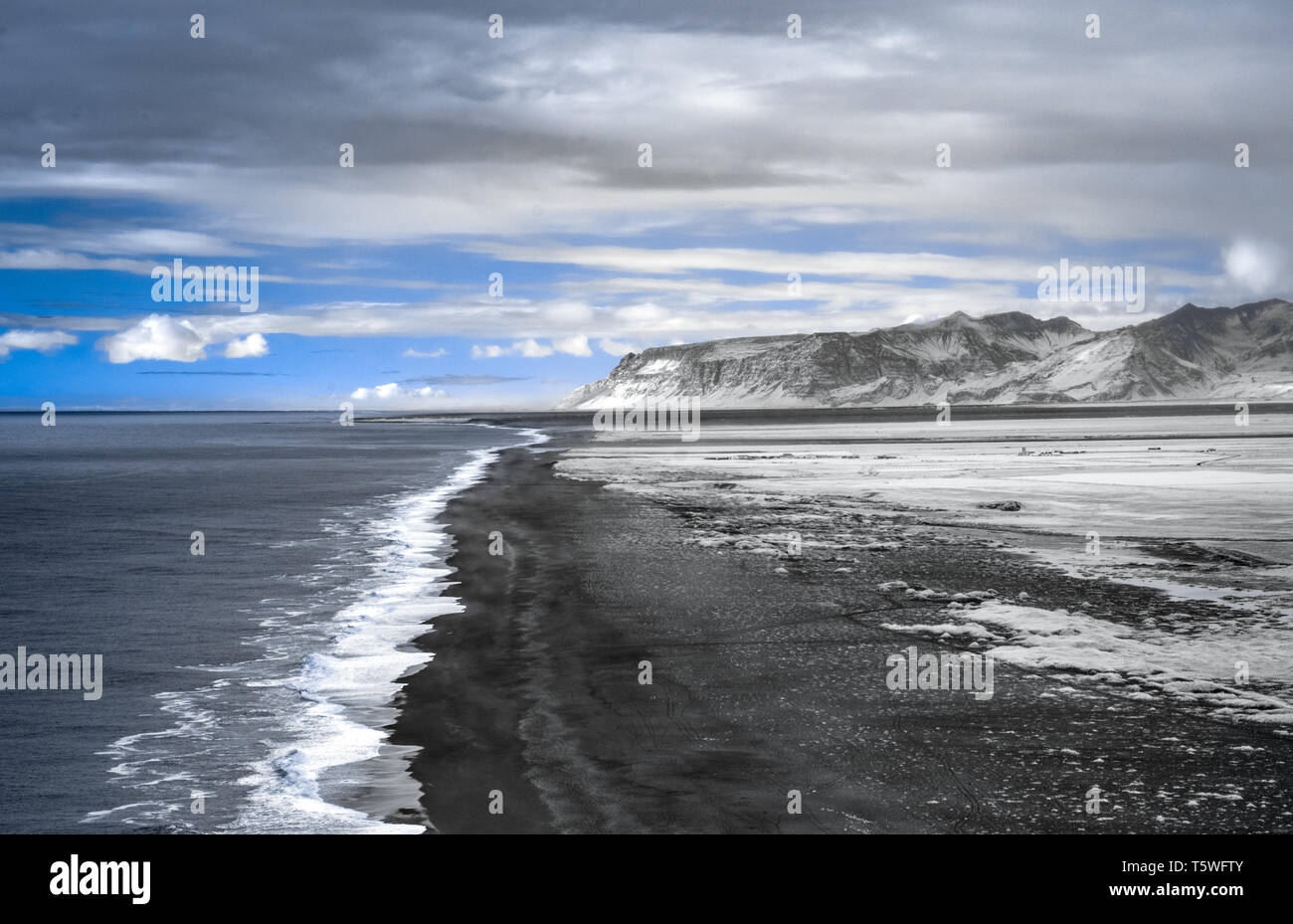 The black sand beach of Reynisfjara on Iceland’s South Coast is one of ...