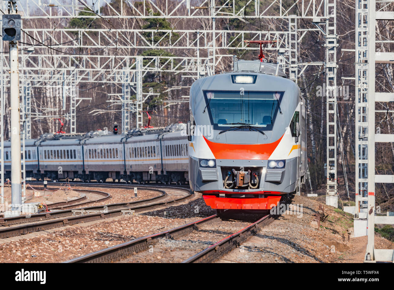 Modern high-speed train arrives to the station at day time. Moscow ...