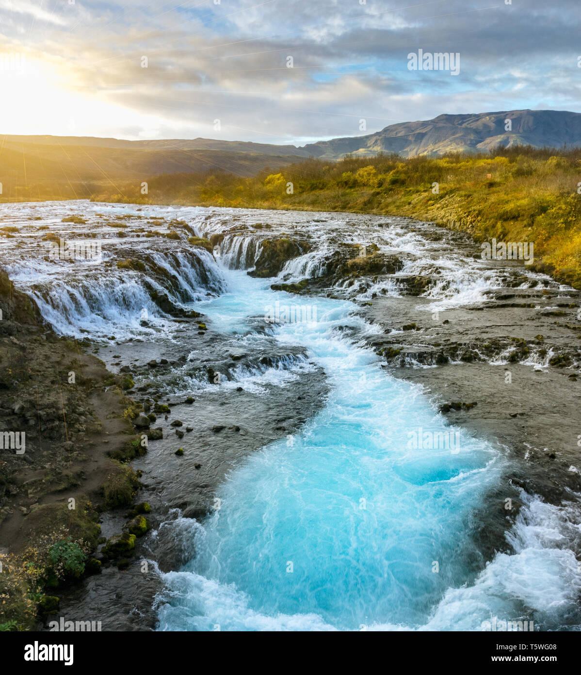 The beautiful Icelandic waterfall Bruarfoss is fed by glacier waters ...