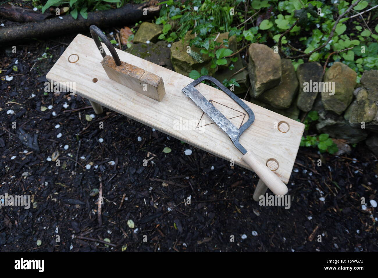roman hand saw on a carpenters bench with herculaneum holdfast ...