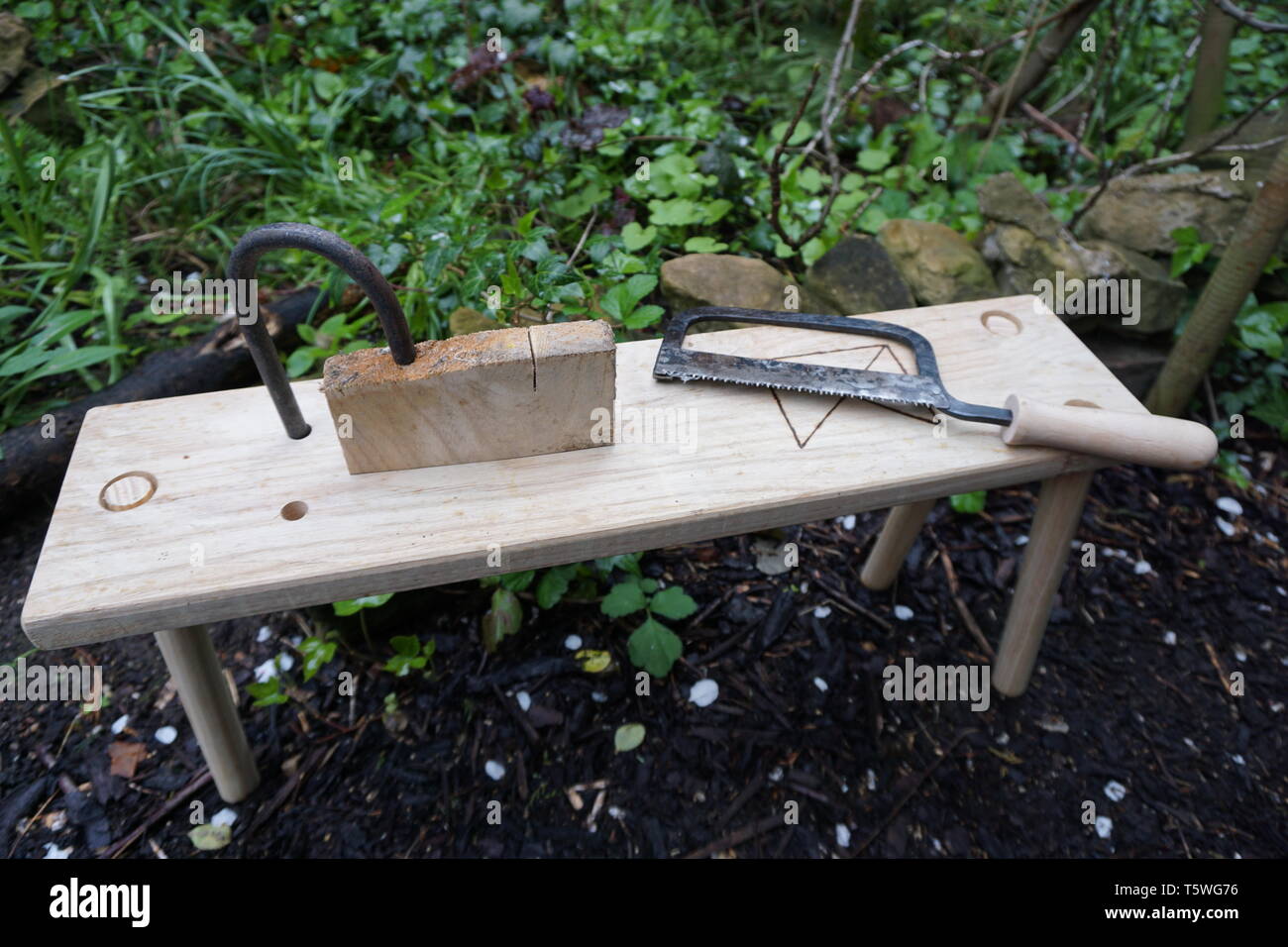 roman hand saw on a carpenters bench with herculaneum holdfast ...