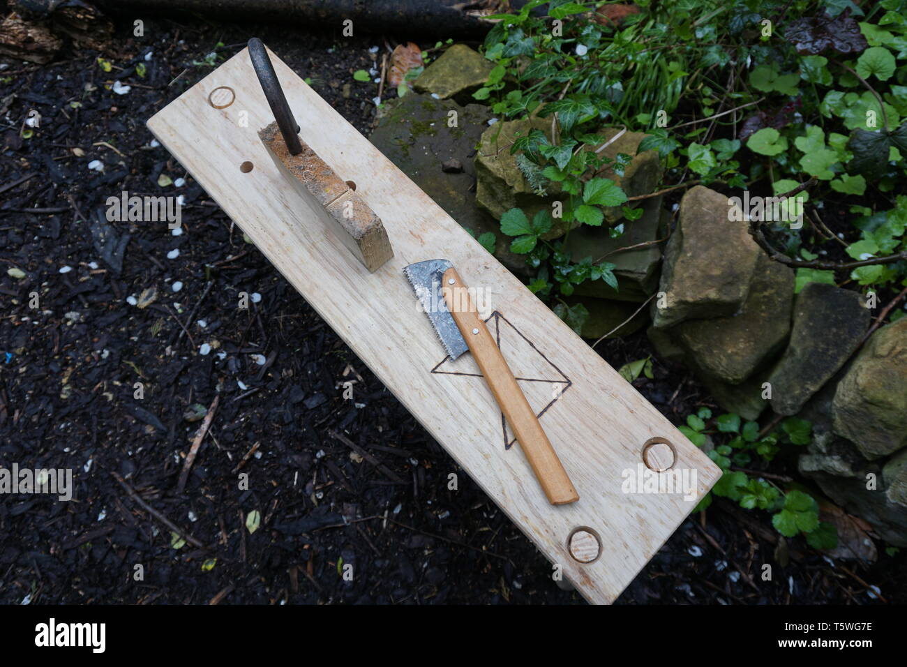roman hand saw on a carpenters bench with herculaneum holdfast ...