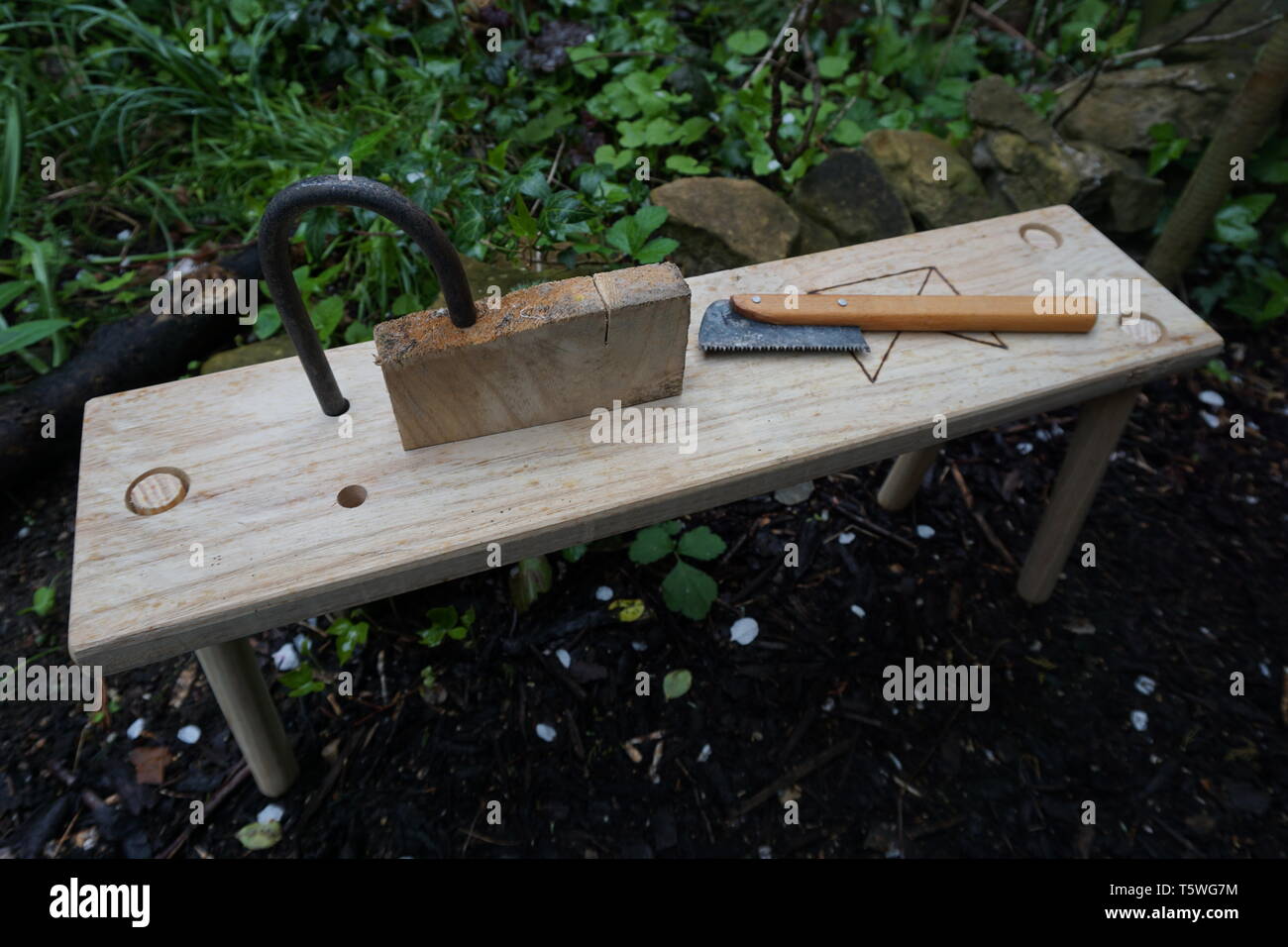 roman hand saw on a carpenters bench with herculaneum holdfast ...