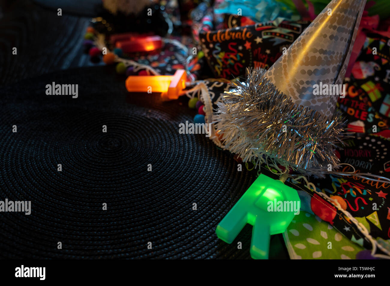 Birthday party themed dark background Stock Photo - Alamy