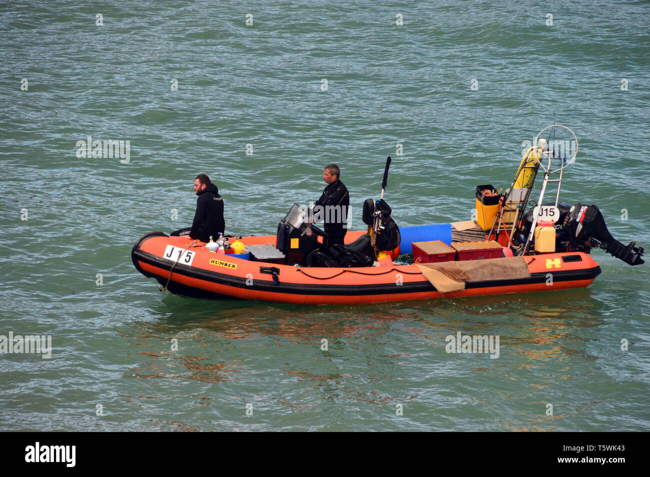 Two men in rubber boat hi-res stock photography and images - Alamy