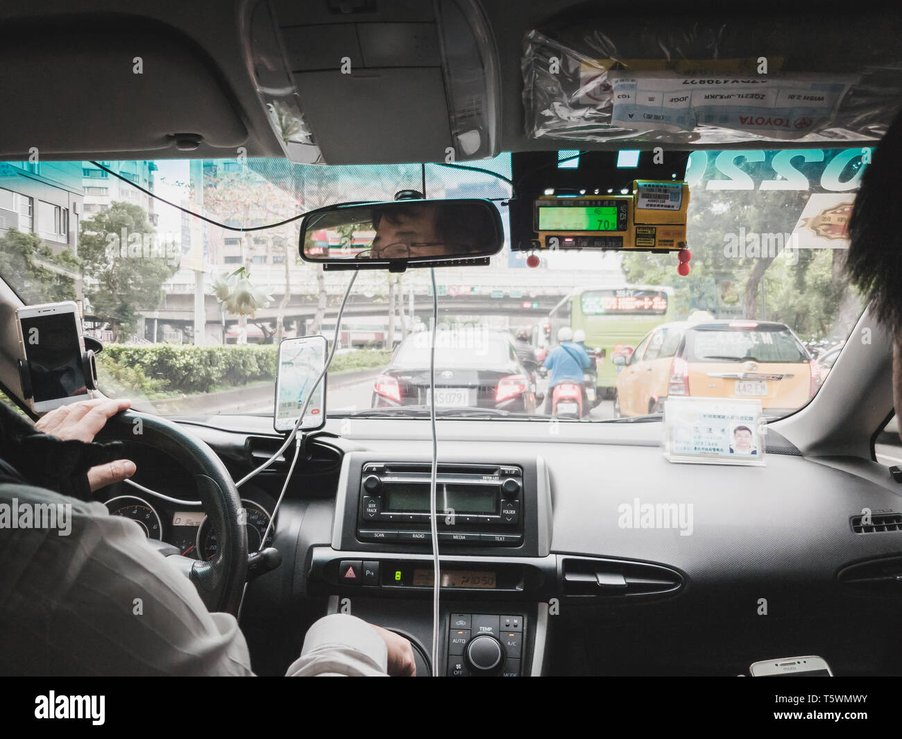 Interior of Taiwan Taxi driving in Taipei city with fare meter running ...