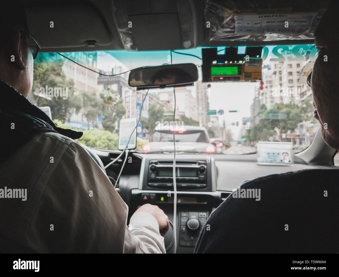 Interior of Taiwan Taxi driving in Taipei city with fare meter running ...