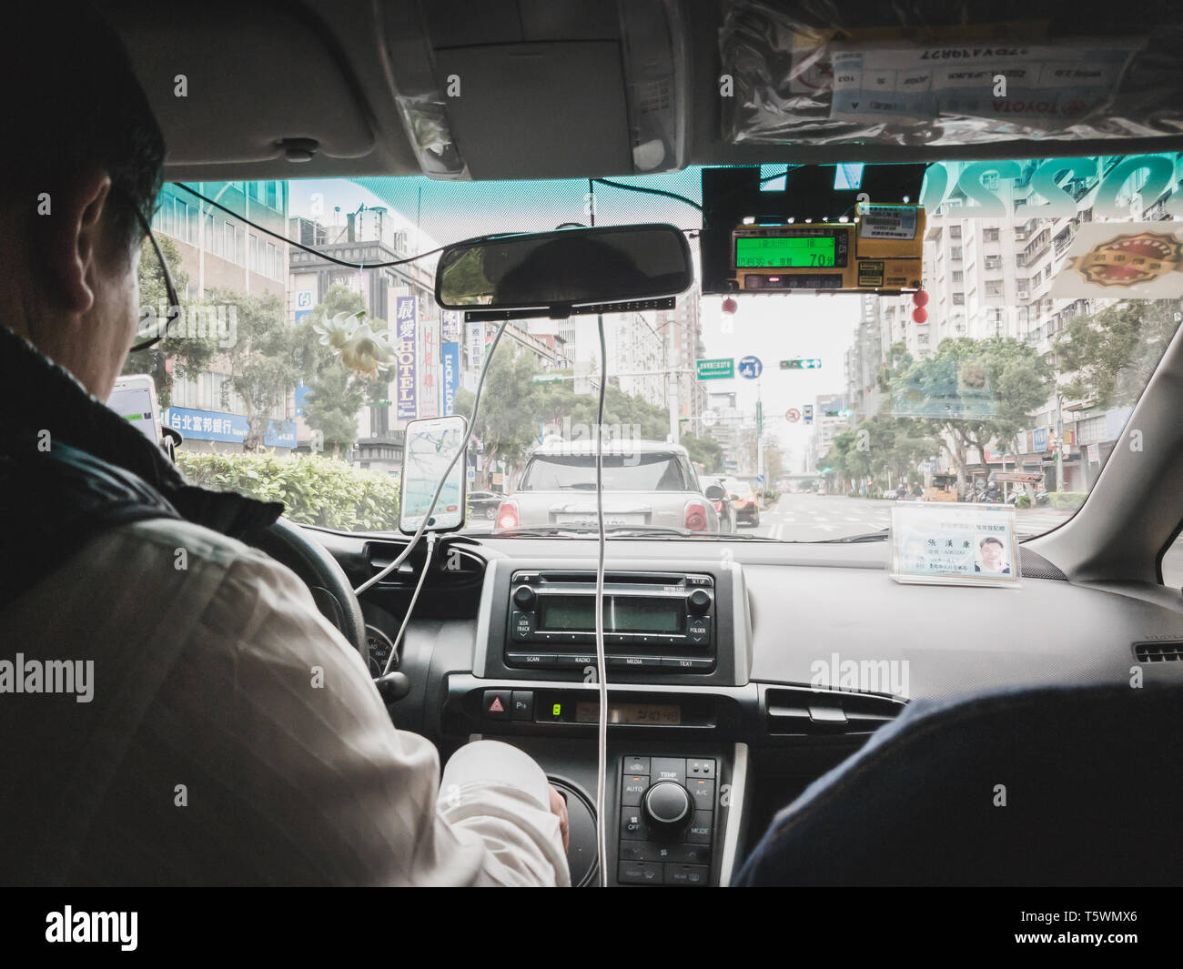 Interior of Taiwan Taxi driving in Taipei city with fare meter running ...