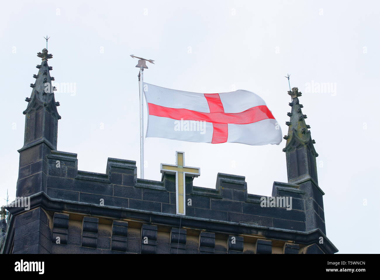 England flag on the roof of St Mary's Church Tower in Swillington Stock ...