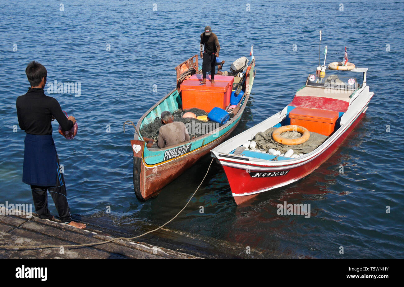 Colorful fishing boats at dock in Kota Kinabalu, Sabah (Borneo ...