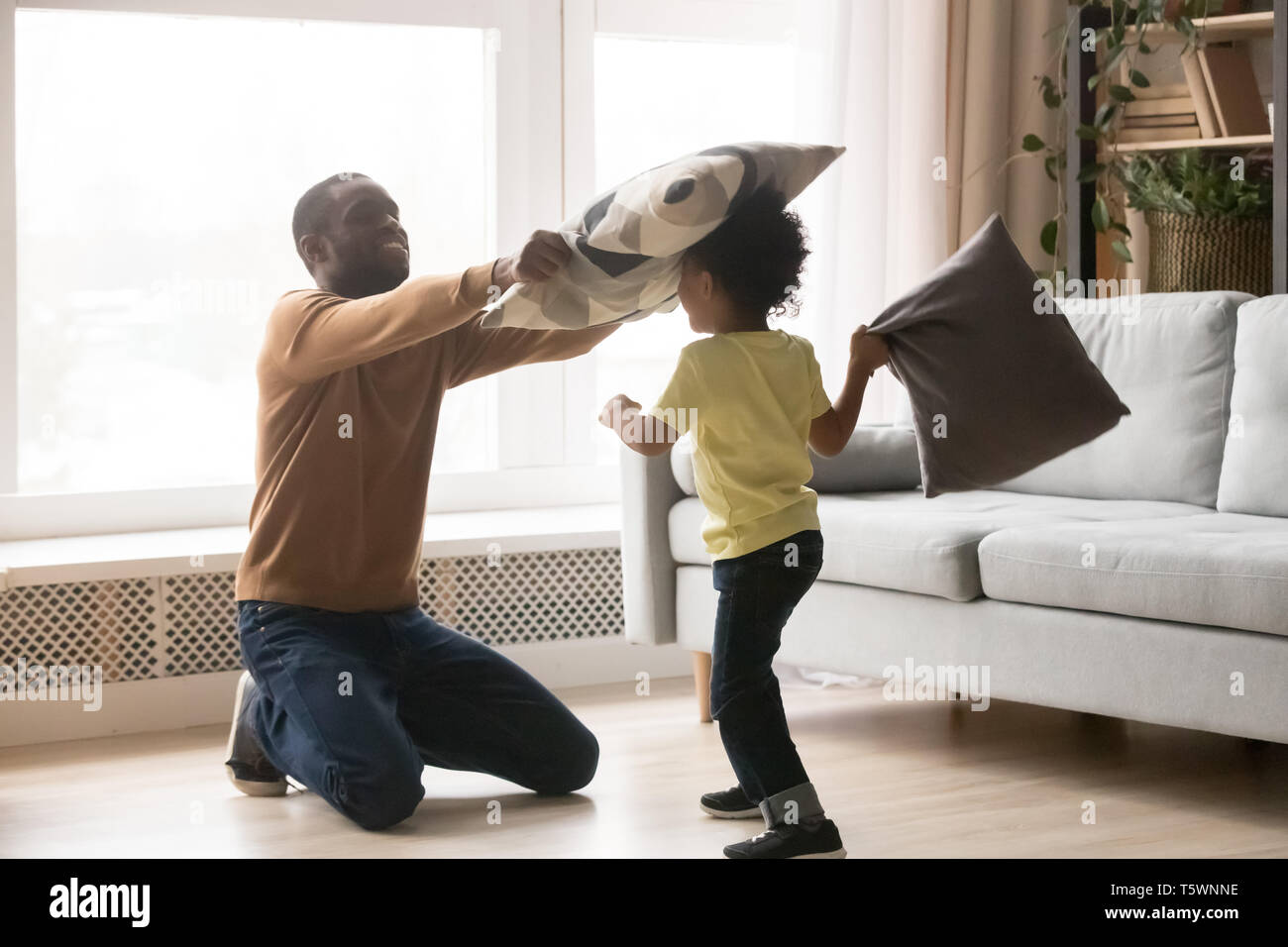 Son fighting hi-res stock photography and images - Alamy