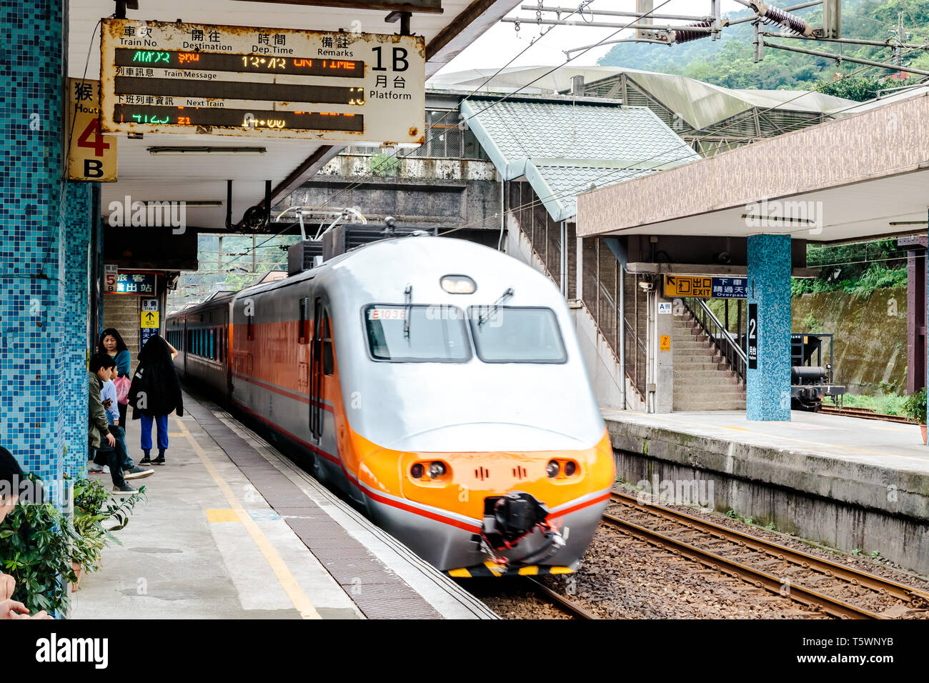 Train approaching the platform at Houtong Station. This station is ...