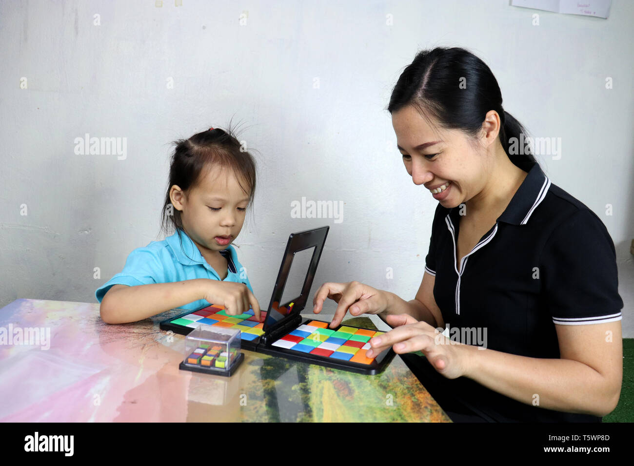 Asian kids playing video game hi-res stock photography and images - Alamy