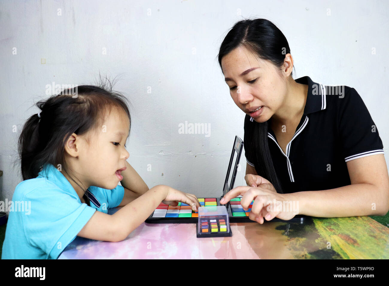 Asian kids playing video game hi-res stock photography and images - Alamy