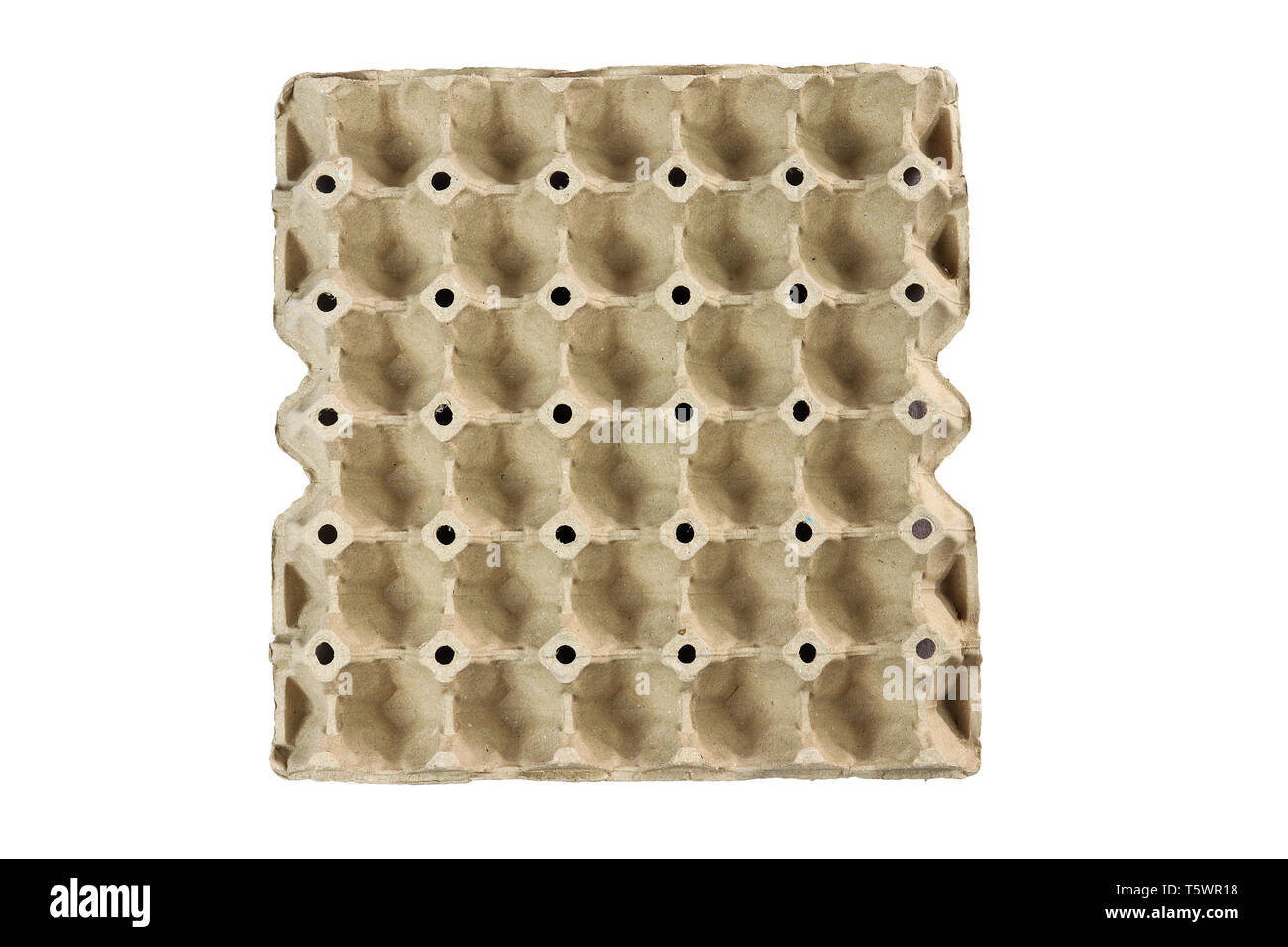 egg tray, Stack cardboard packaging for eggs isolated on black ...