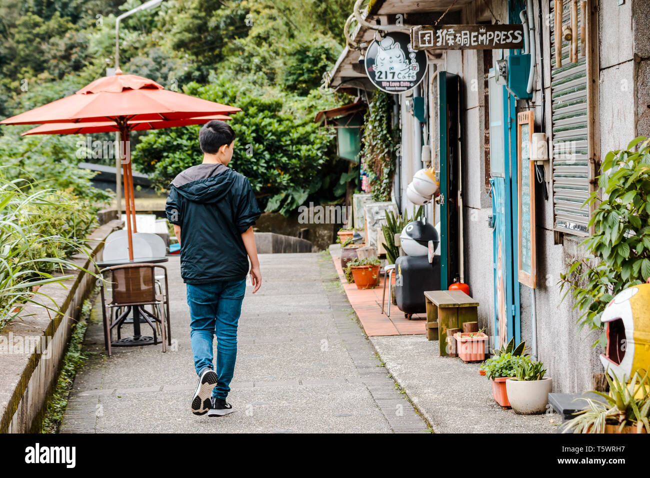 Ruifang, Taiwan - April 14, 2019: Tourist walking by a Cat Cafe in ...