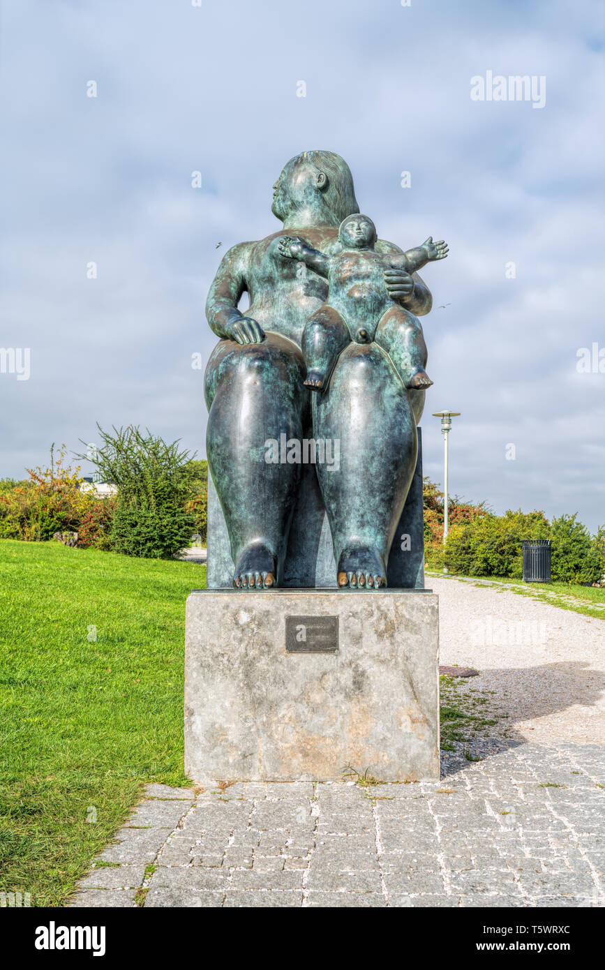 Fernando Botero sculpture. Motherhood near the entrance to the park ...