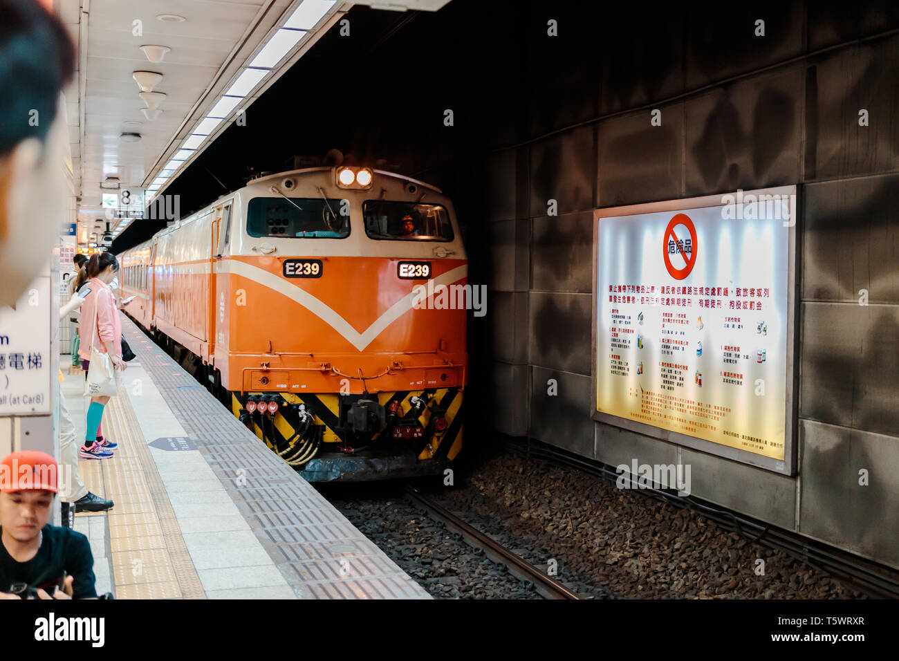 Locomotive Train approaching the platform at Taipei Main Station with ...
