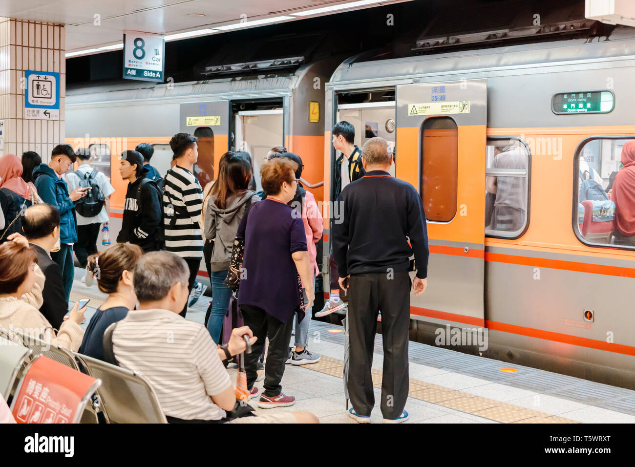 Passengers and tourist boarding a train at Taipei Main Station Stock ...