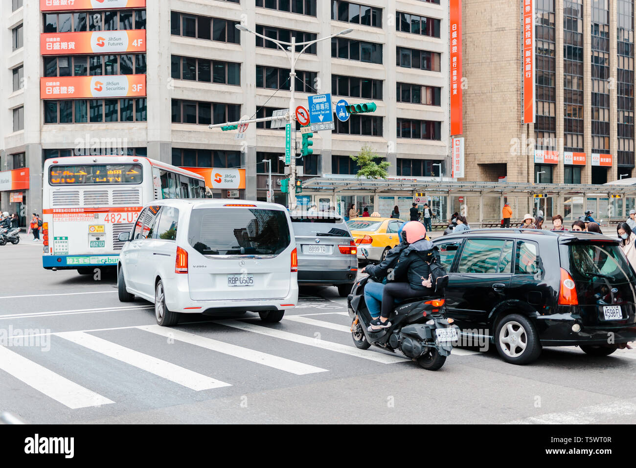 Car, Bus, and motorcycle stuck in a traffic jam at the intersection in ...