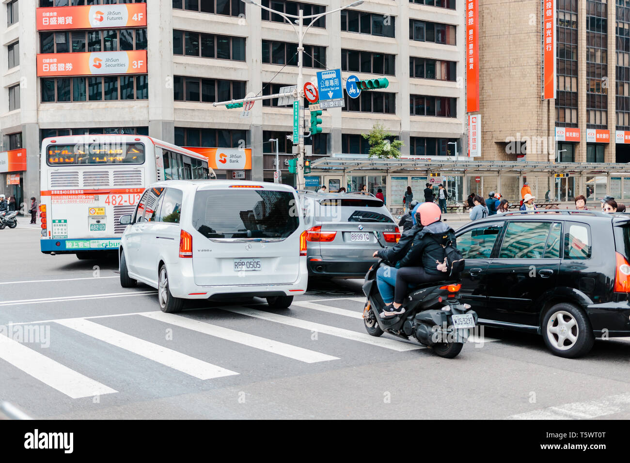 Car, Bus, and motorcycle stuck in a traffic jam at the intersection in ...