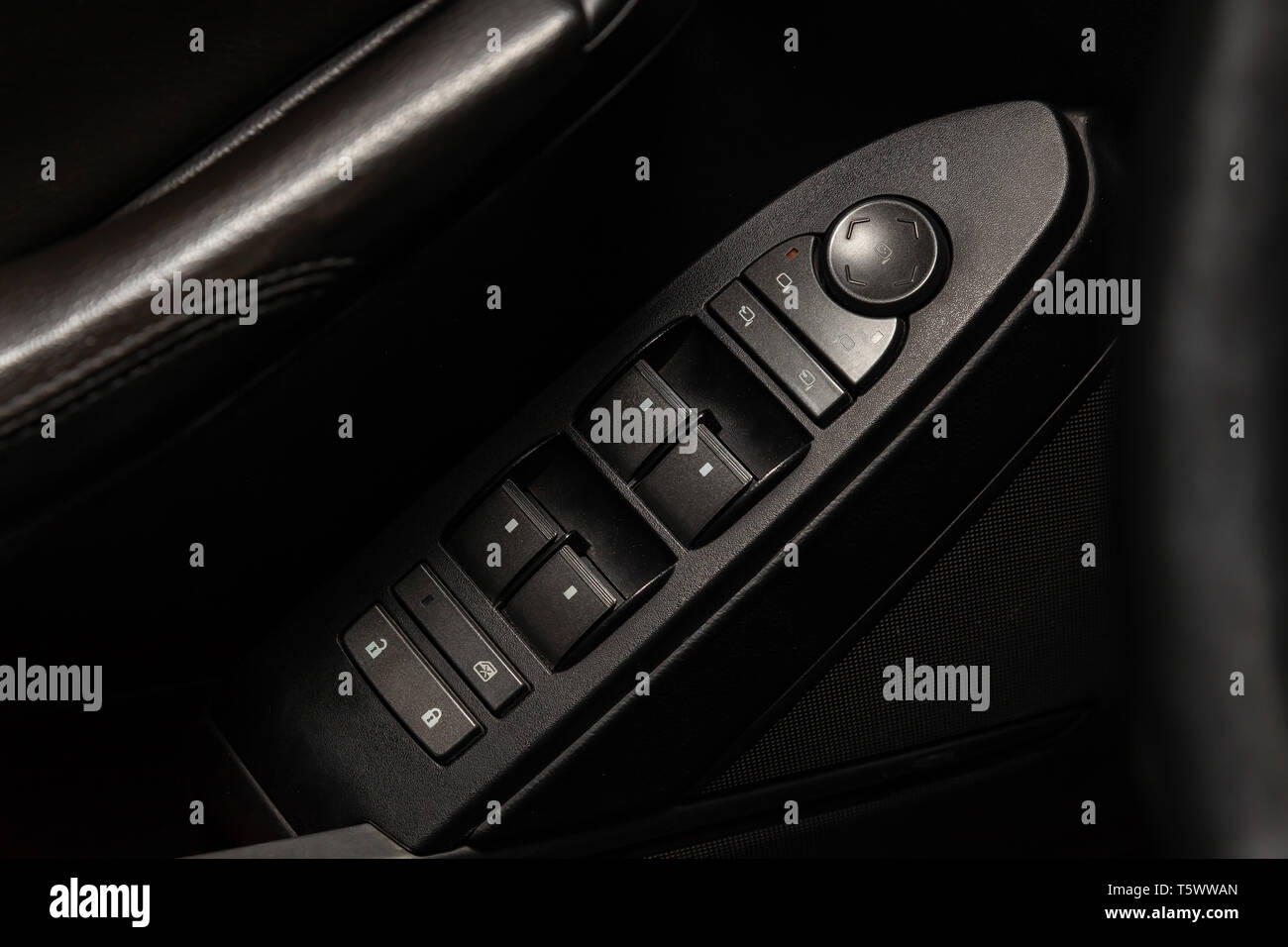 Interior view with drivers door, window and side mirrors adjust buttons ...