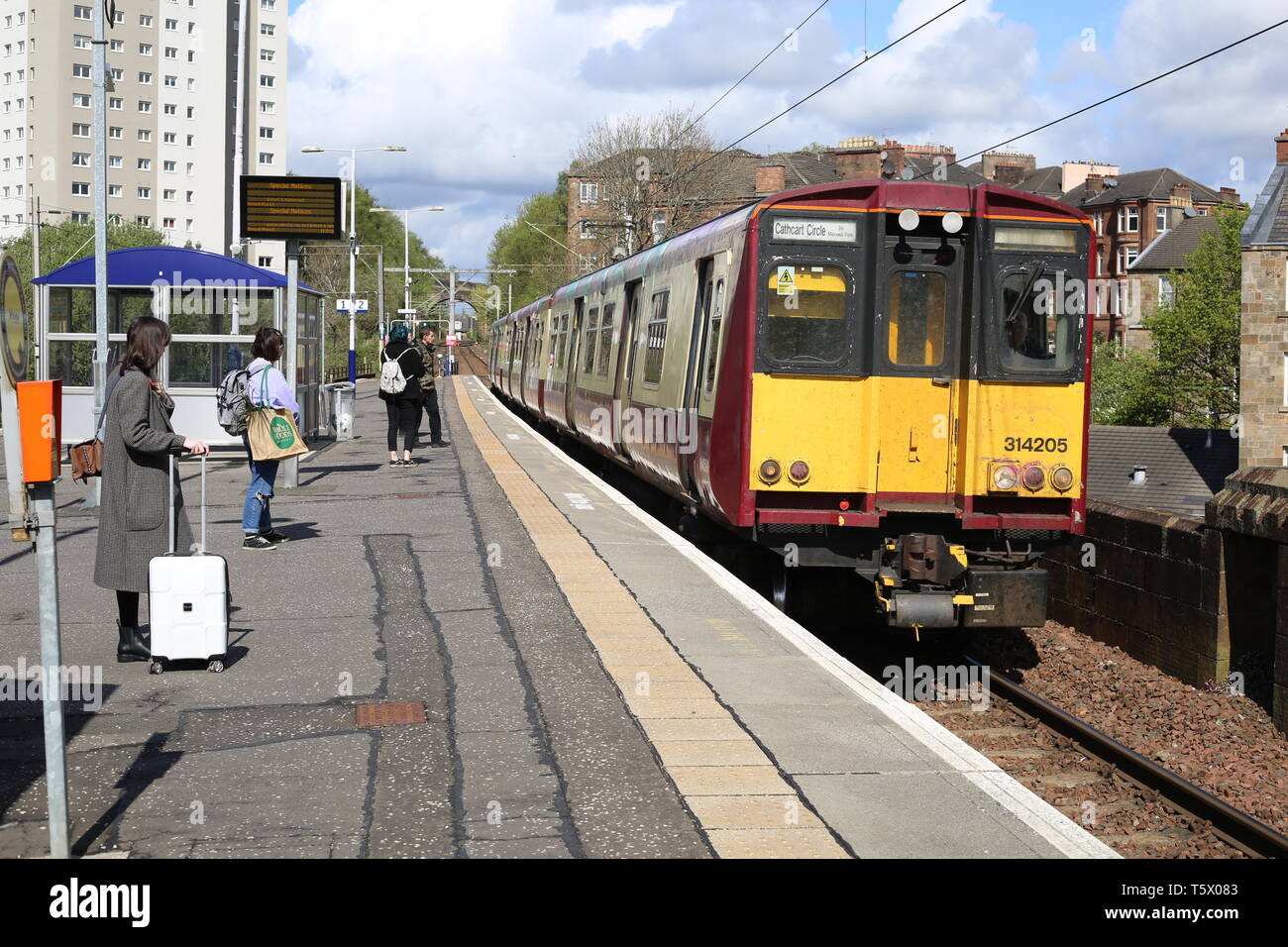 old rustic train arrives at platform outside town Stock Photo - Alamy