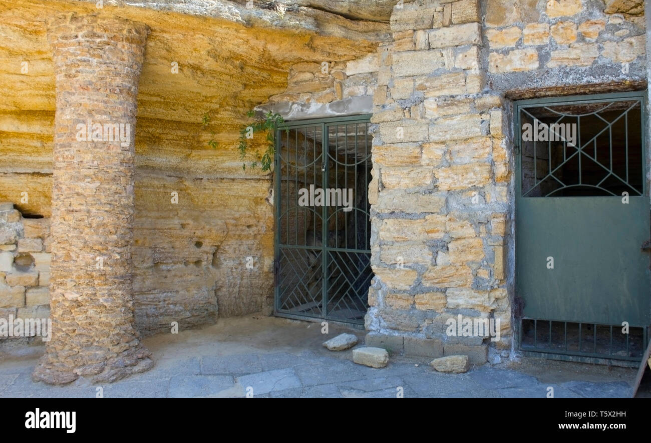 entrance to the catacombs with metal door Stock Photo - Alamy