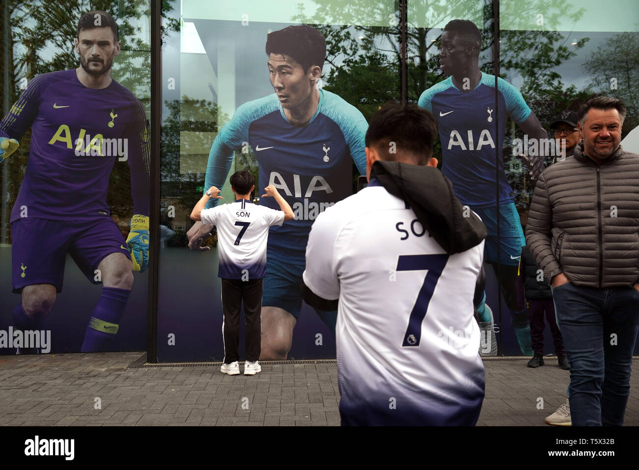 Tottenham Hotspur fans take photos before the Premier League match at ... Tottenham Hotspur fans take photos before the Premier League match at ...