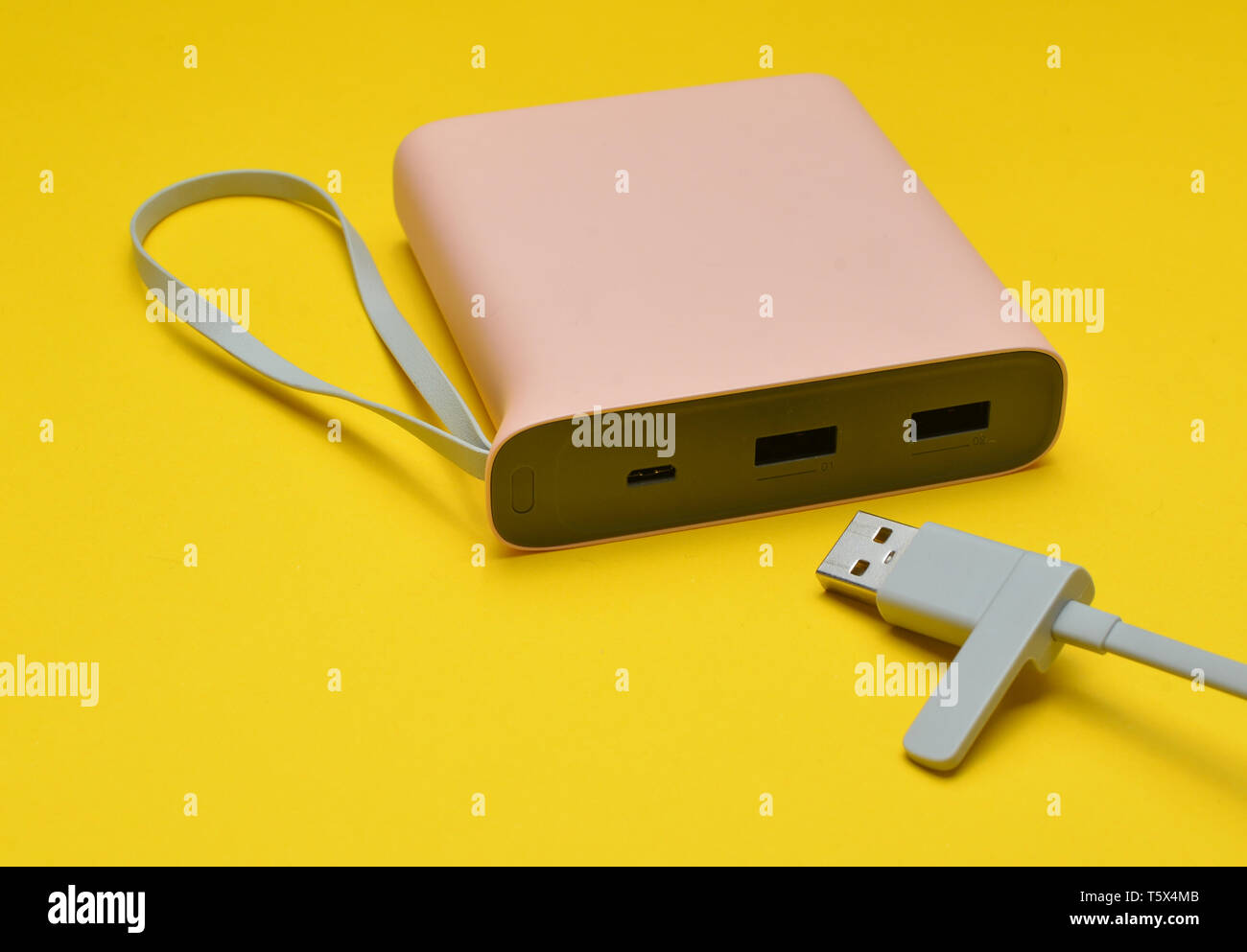 Power bank for charging smartphones and gadgets with a usb cable close ...