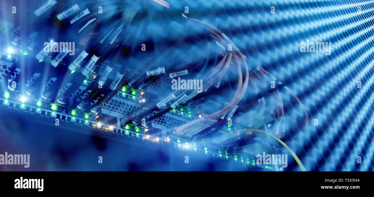 Close up fiber optic and hub in server room Stock Photo - Alamy