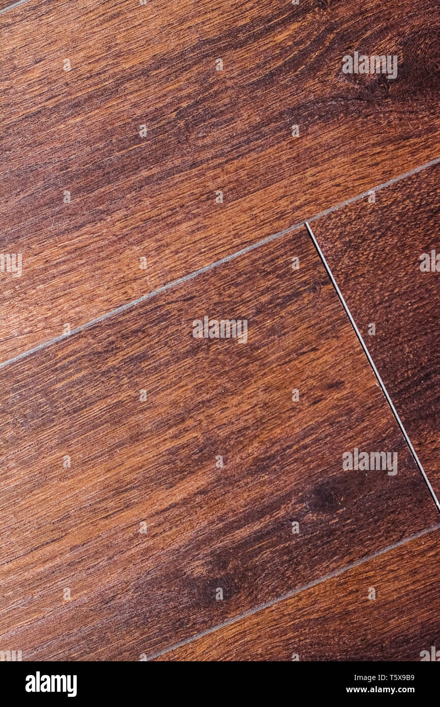 Flooring, new apartment and home renovation concept - Red wood texture ...