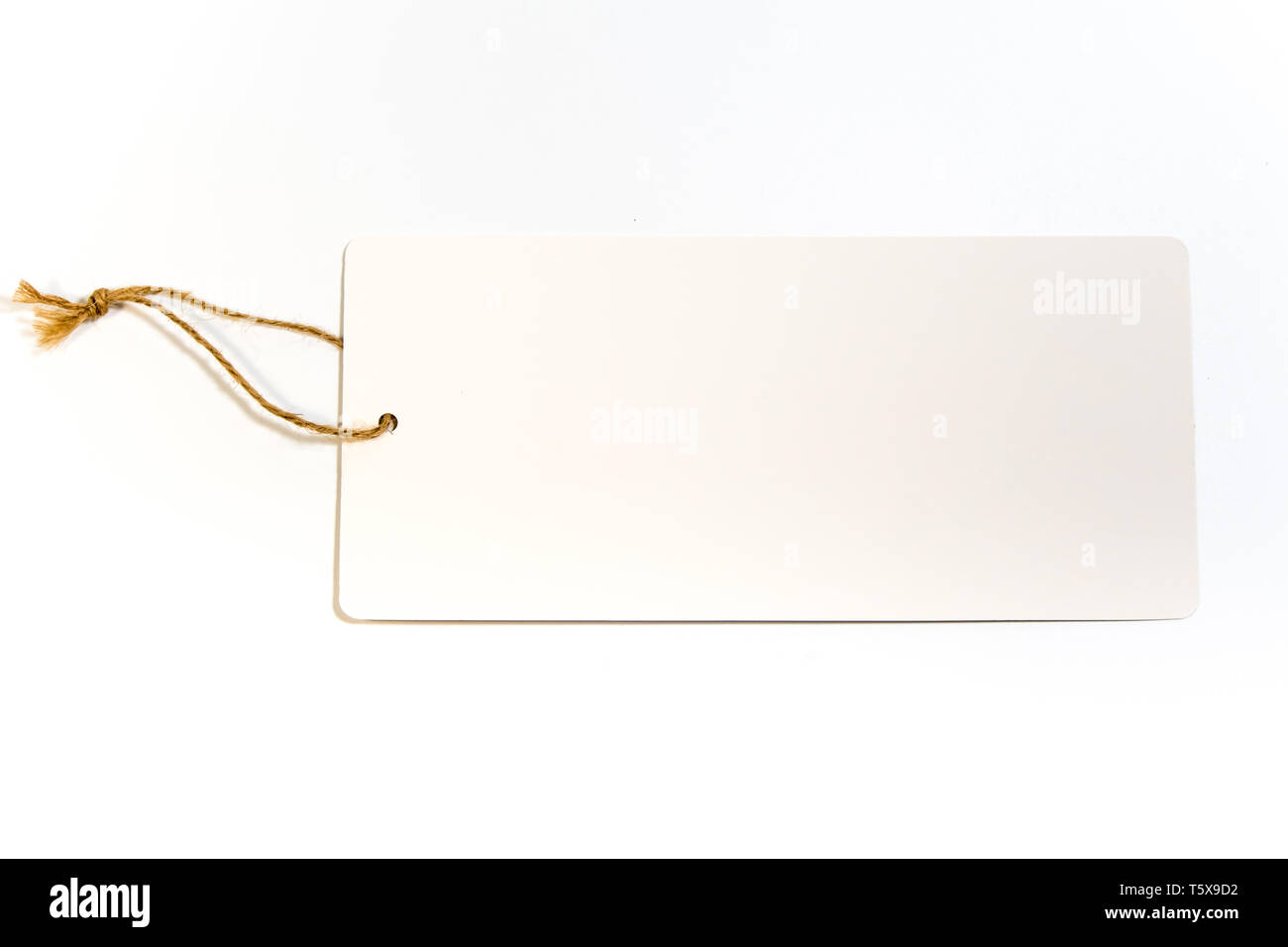 Blank white paper label on white background Stock Photo - Alamy