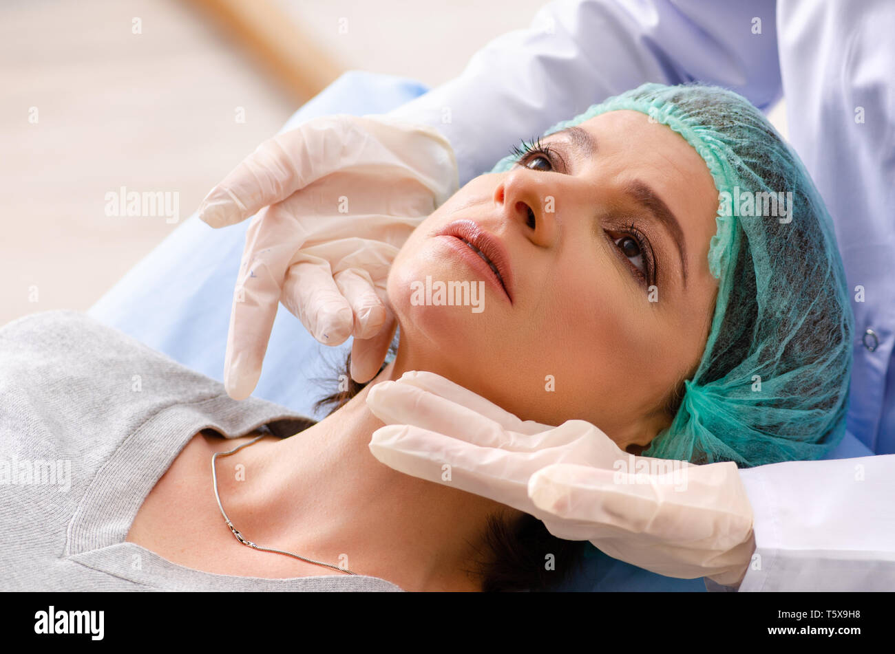 Woman preparing for cosmetic plastic surgery Stock Photo - Alamy