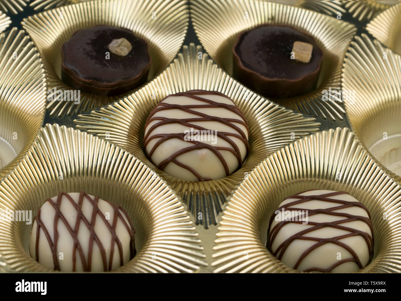 Open box of candies. Macro photo Stock Photo - Alamy