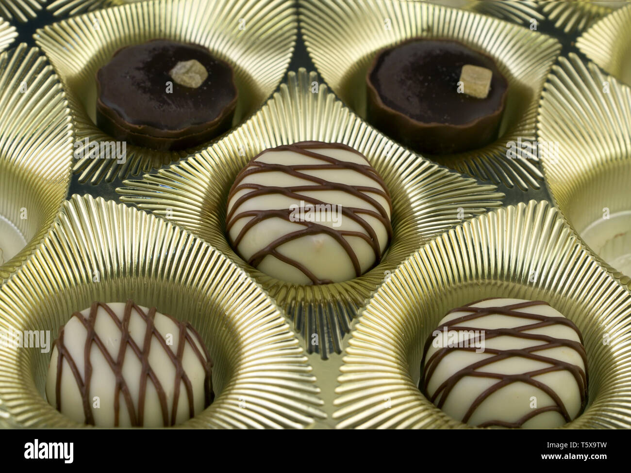 Open box of candies. Macro photo Stock Photo - Alamy